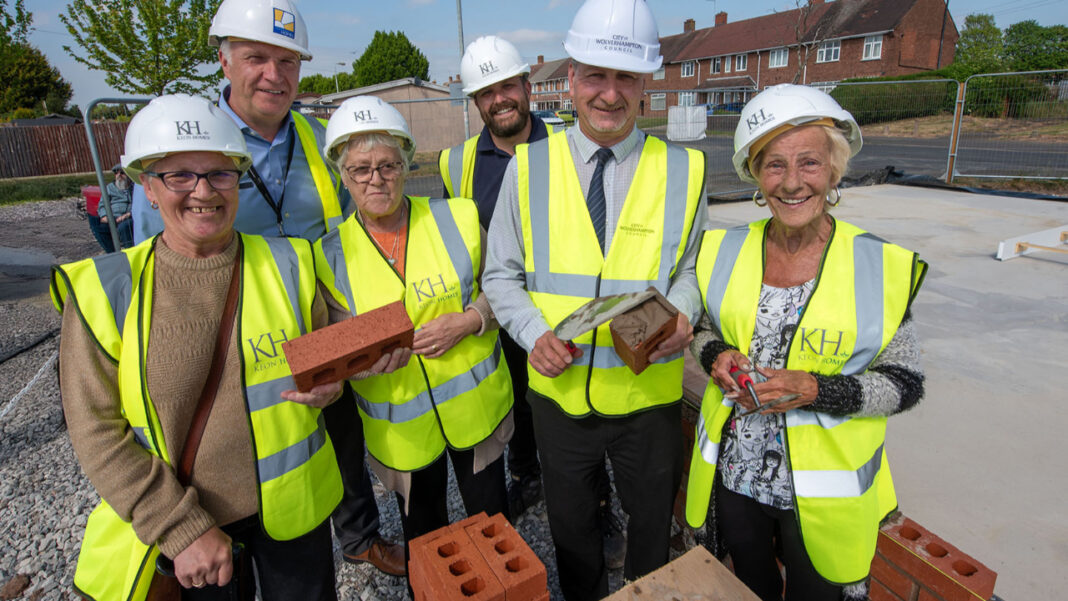 Residents lay first bricks for almost 100 new energy-efficient council homes in Wolverhampton ...